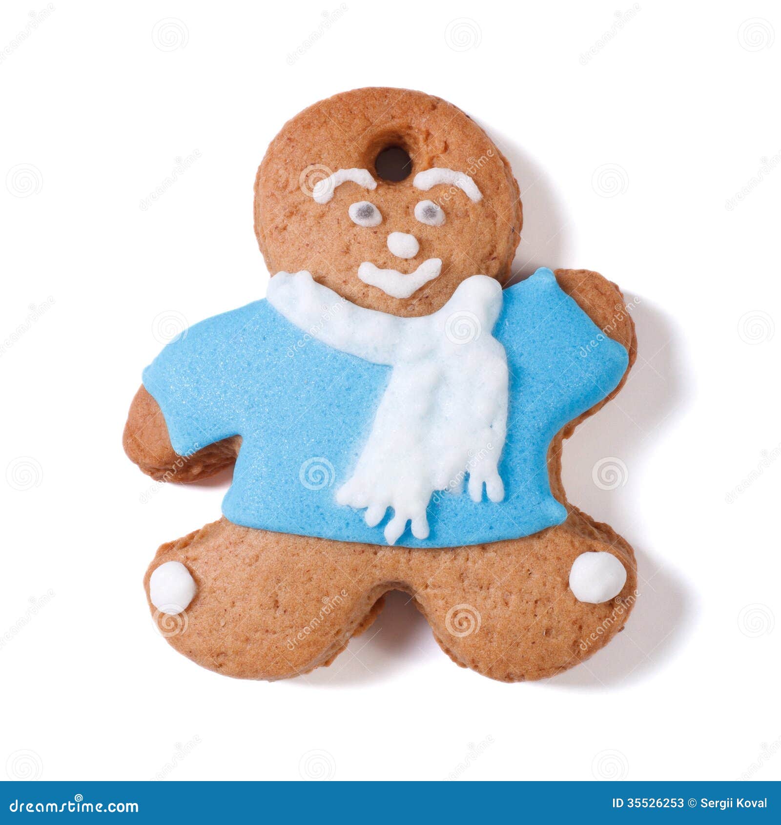 Gingerbread Man in a Blue Coat and Scarf Isolated Stock Image - Image ...