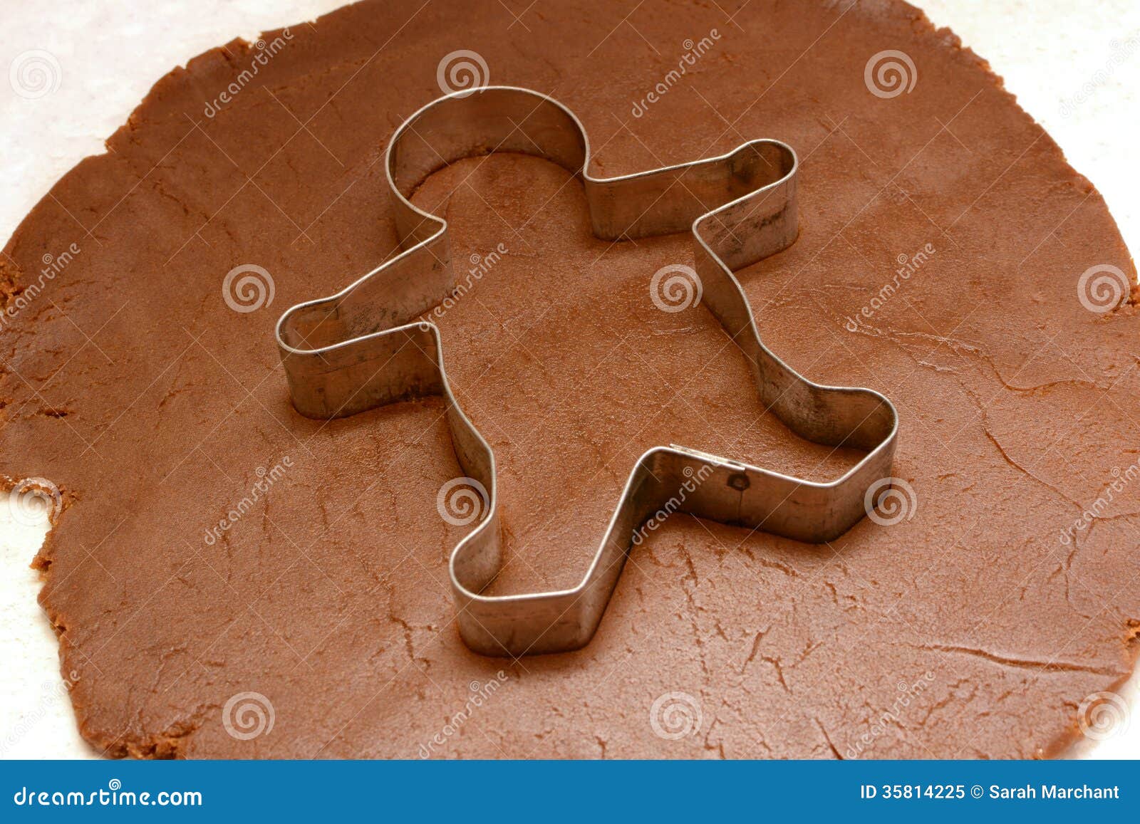 Gingerbread Man Cutter on Cookie Dough Stock Image - Image of snack ...