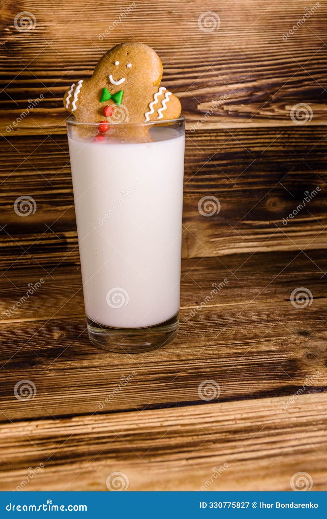 Gingerbread Man in a Glass of Milk on Wooden Table Stock Image - Image ...