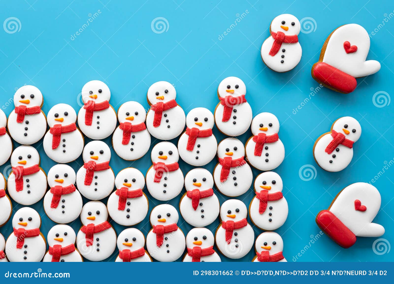Gingerbread Snowmen Covered with Icing on a Blue Background, Flat Lay ...