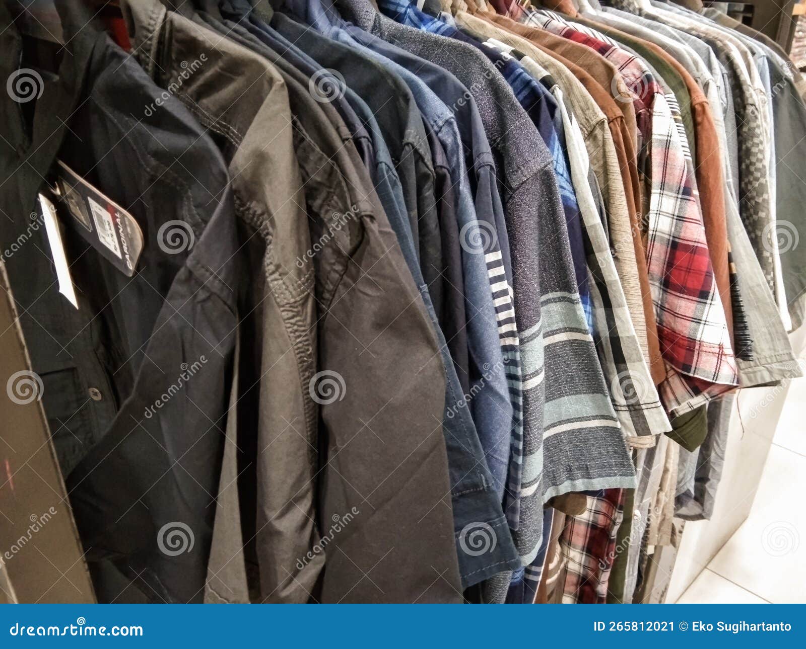 A Gingham Shirt on a Clothes Rack in a Mall Stock Image - Image of ...