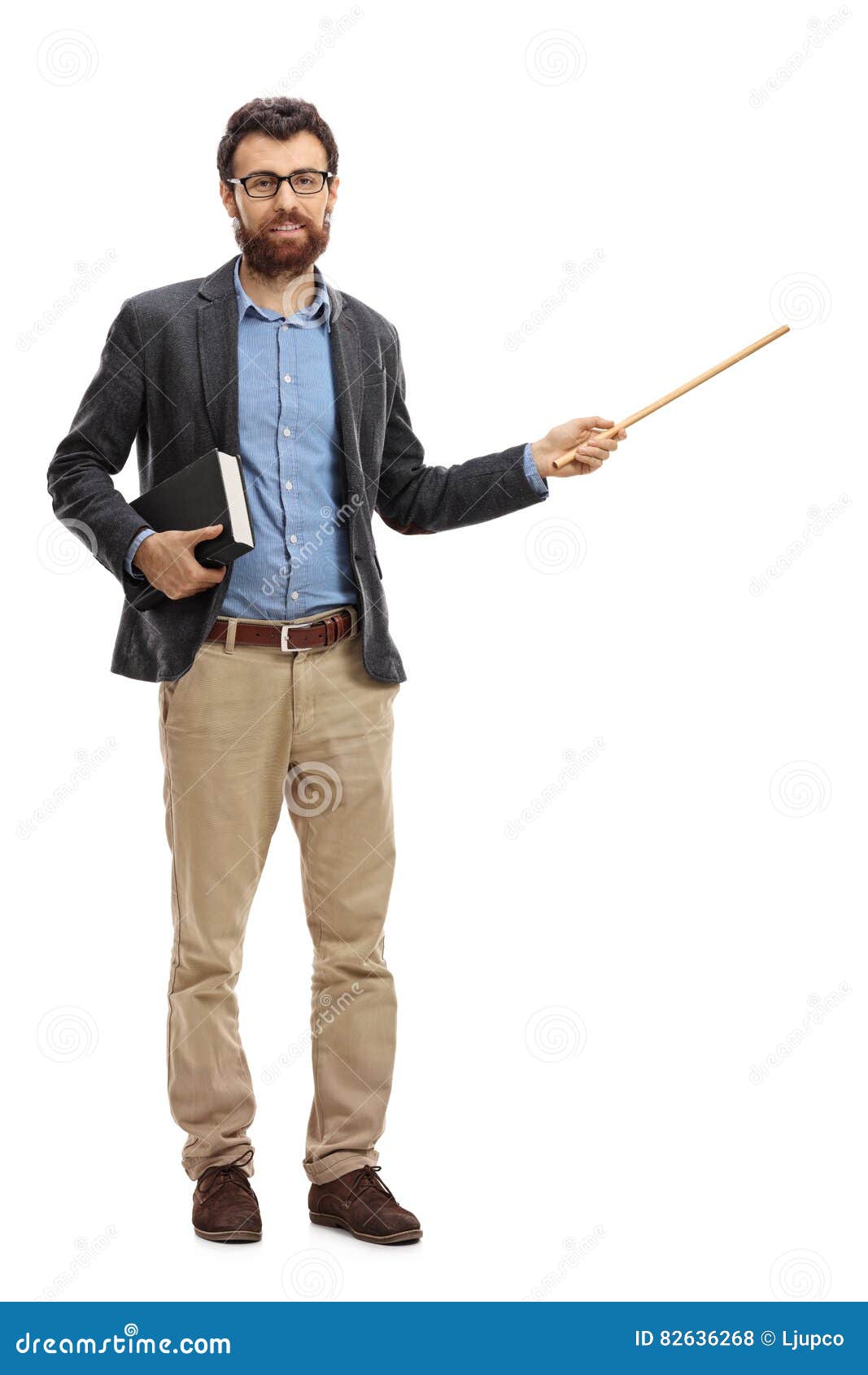 Giovane Insegnante Che Tiene Un Libro E Una Bacchetta Fotografia Stock ...