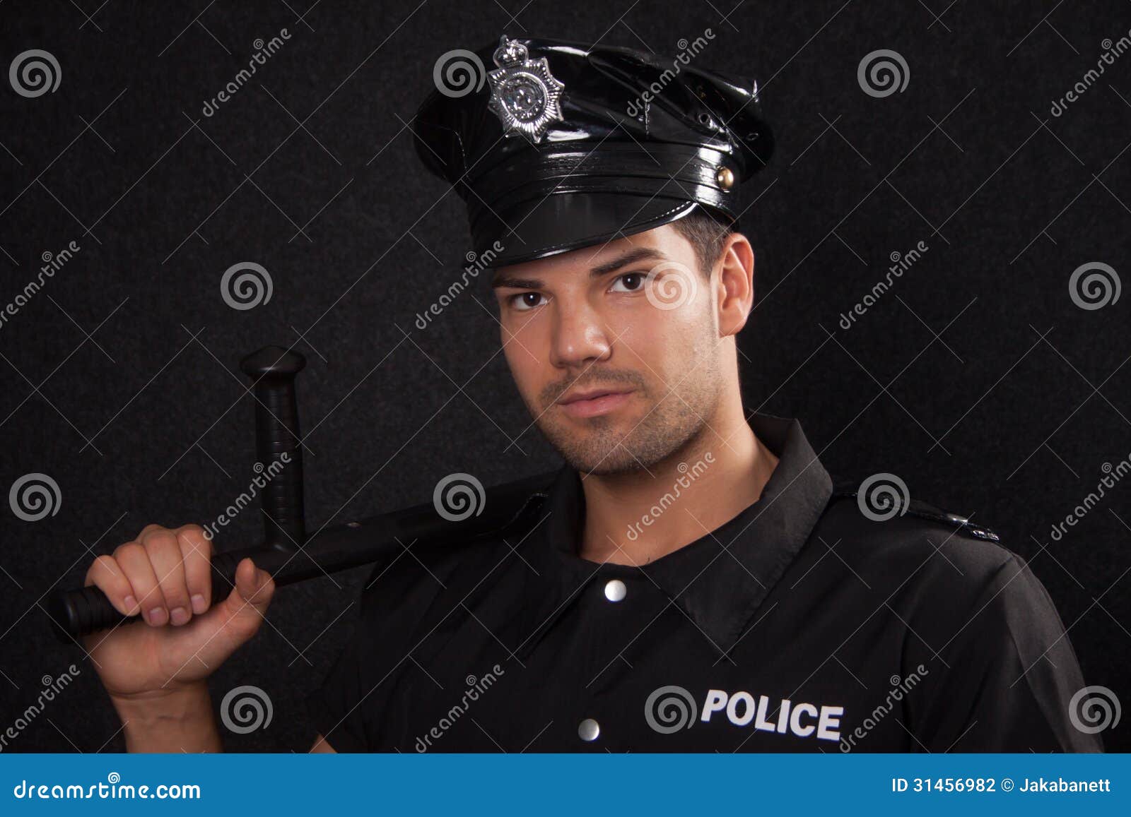 Giovane Poliziotto Con Il Black Jack Fotografia Stock - Immagine di ...