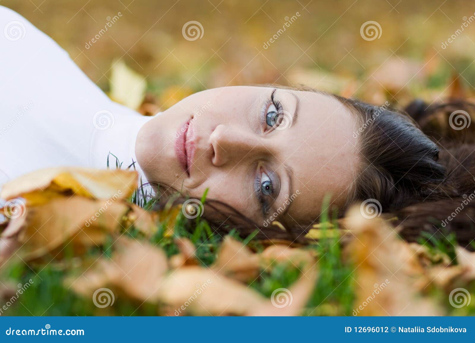 Girl stock photo. Image of adult, lying, face, hair, happy - 12696012