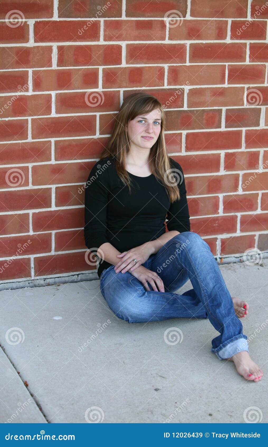 Girl against brick wall stock image. Image of eyes, blond - 12026439
