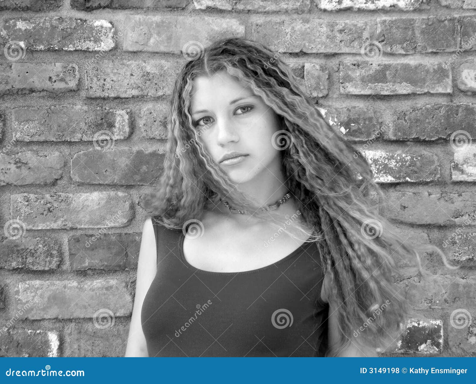 Girl Against Brick Wall Picture. Image: 3149198