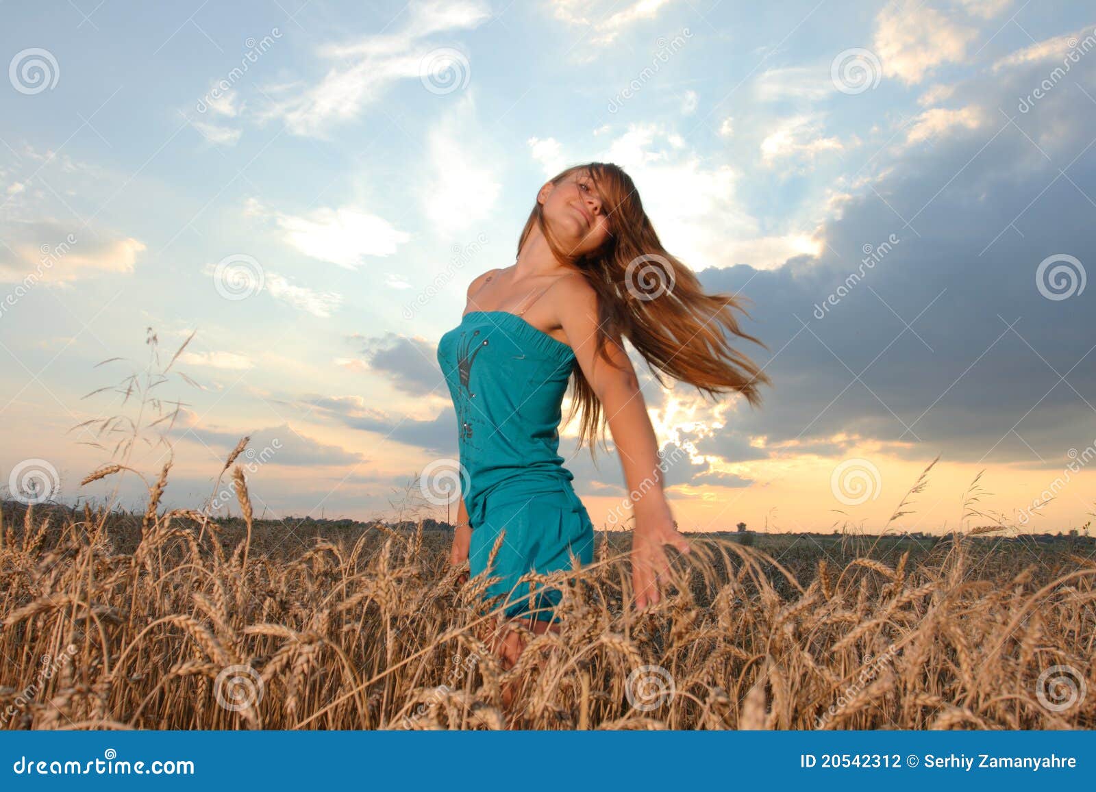 Girl against sunset sky stock photo. Image of happy, field - 20542312