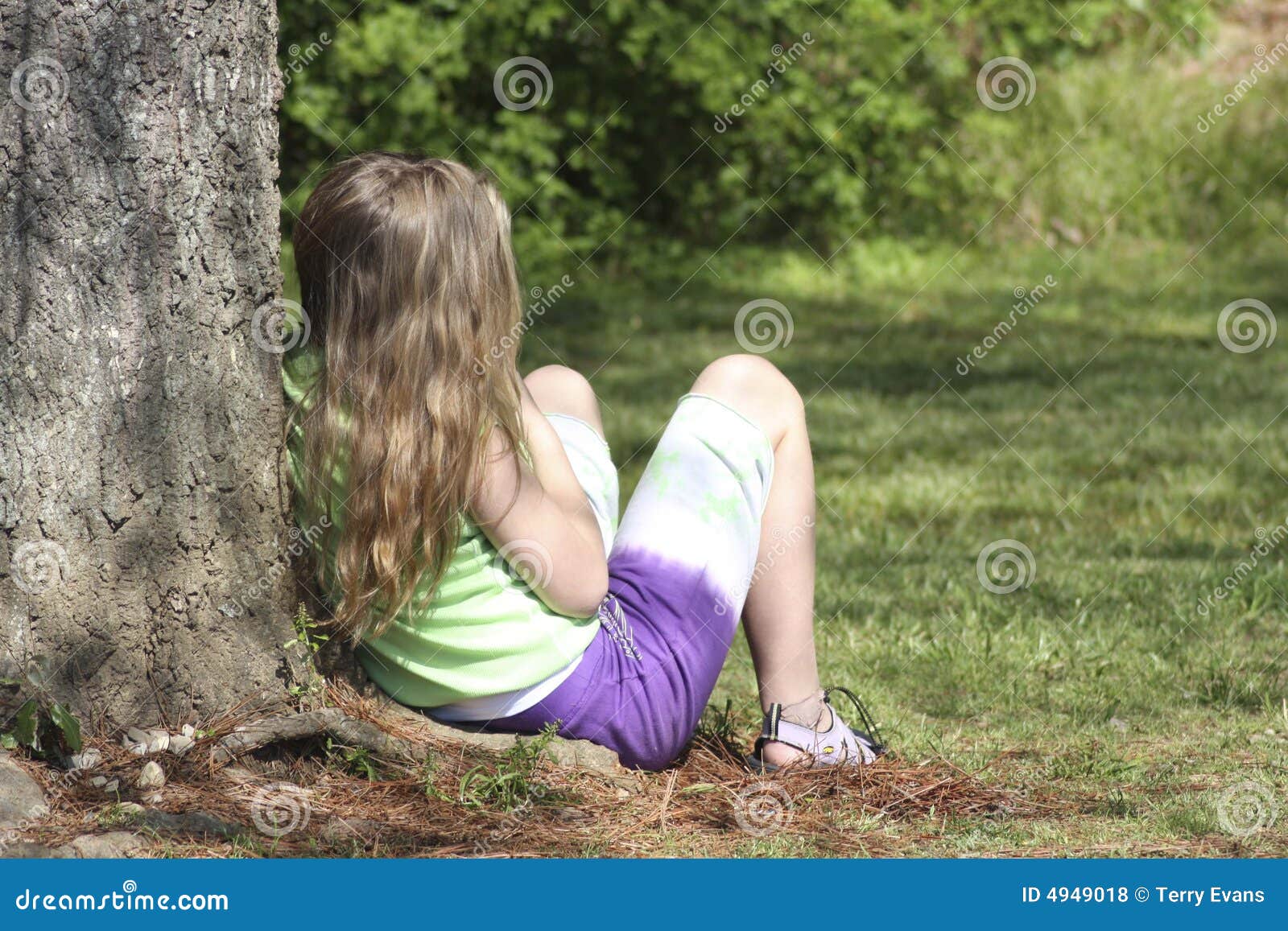 Girl Against Tree stock photo. Image of grass, young, solitude - 4949018