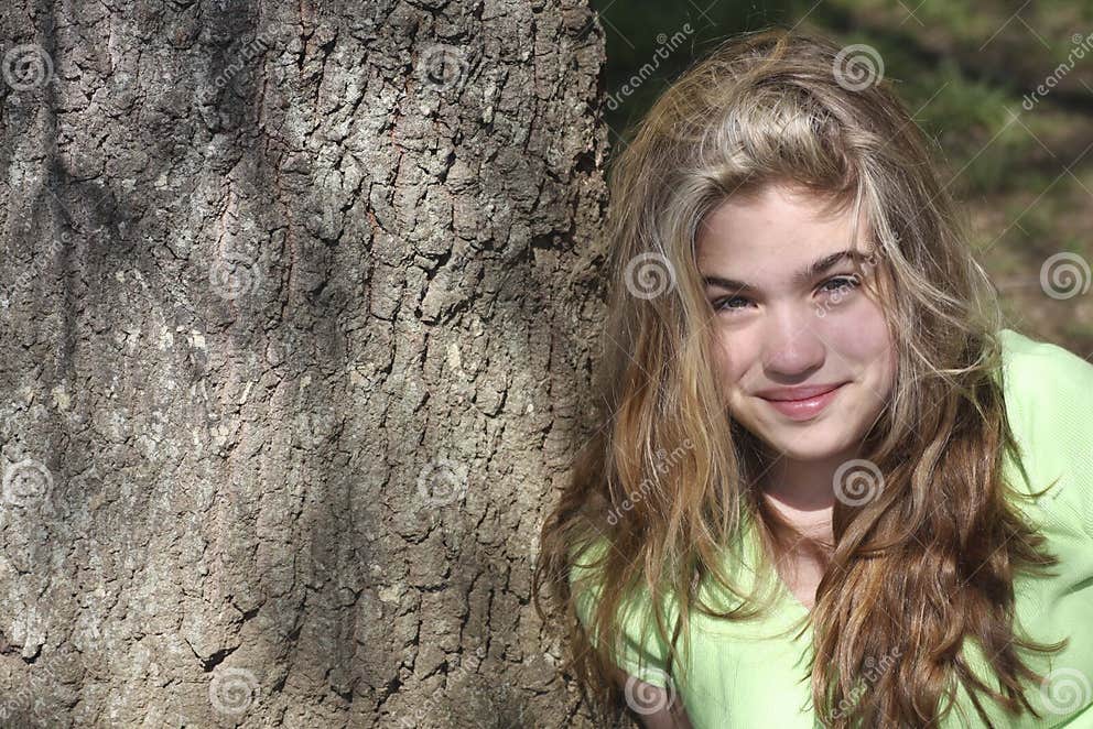 Girl Against Tree stock image. Image of beautiful, park - 4949023