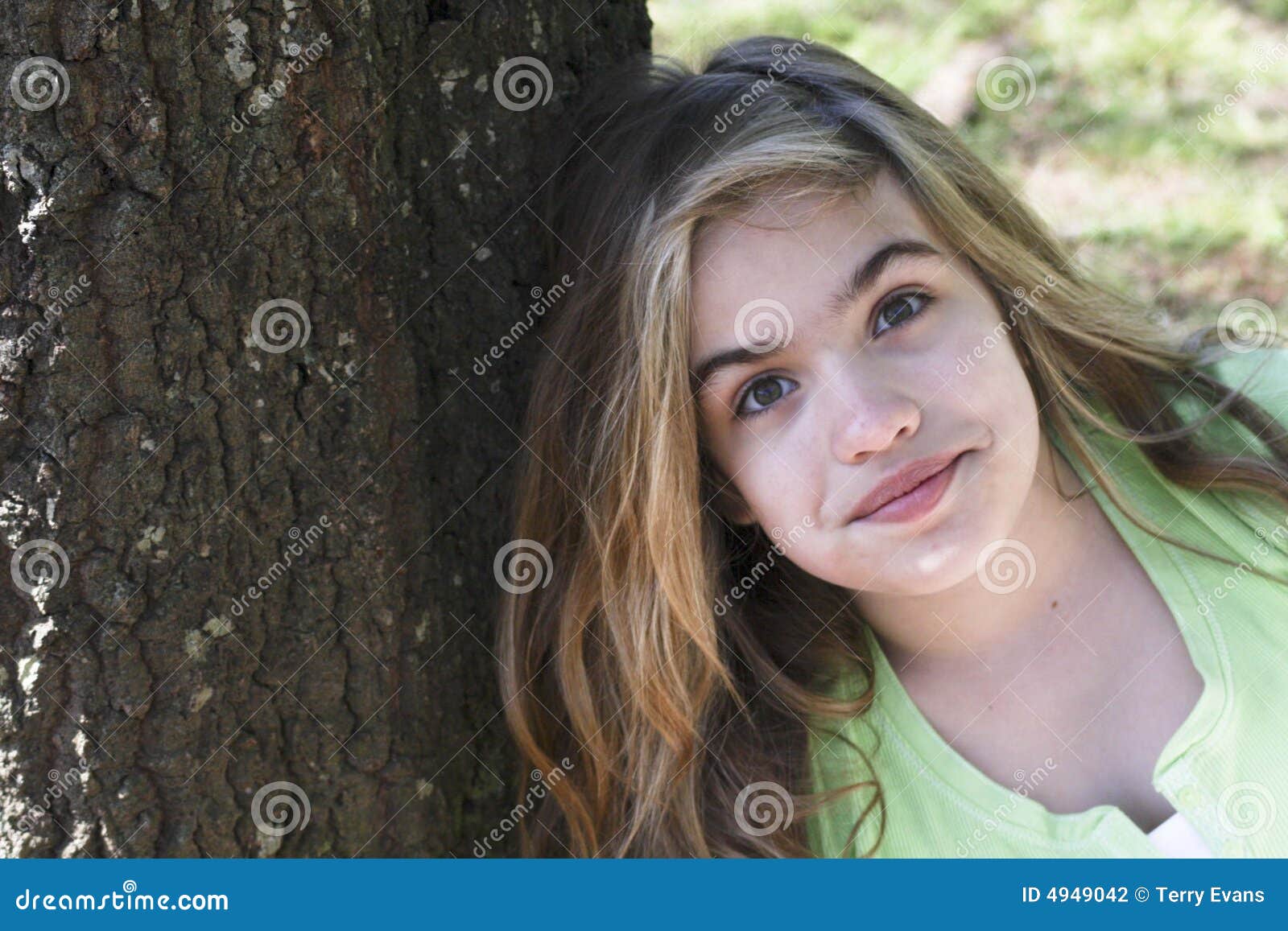 Girl Against Tree stock photo. Image of grass, peace, thinking - 4949042