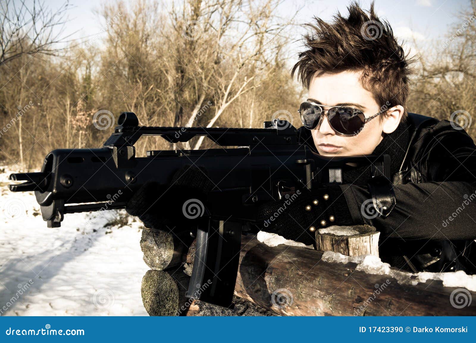 Girl aiming a machine gun stock photo. Image of caucasian - 17423390