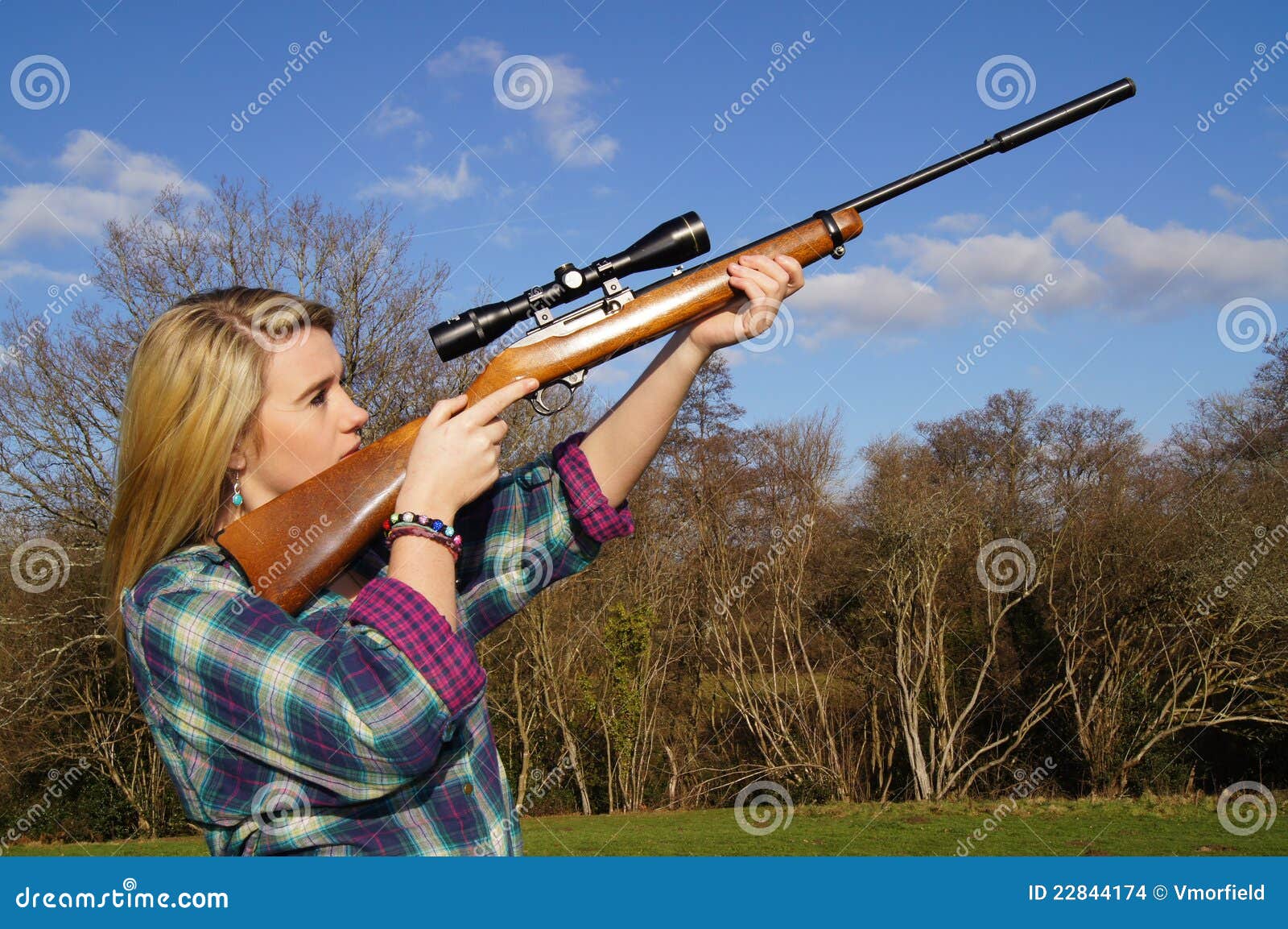 Girl Aiming Rifle stock photo. Image of outside, fire - 22844174