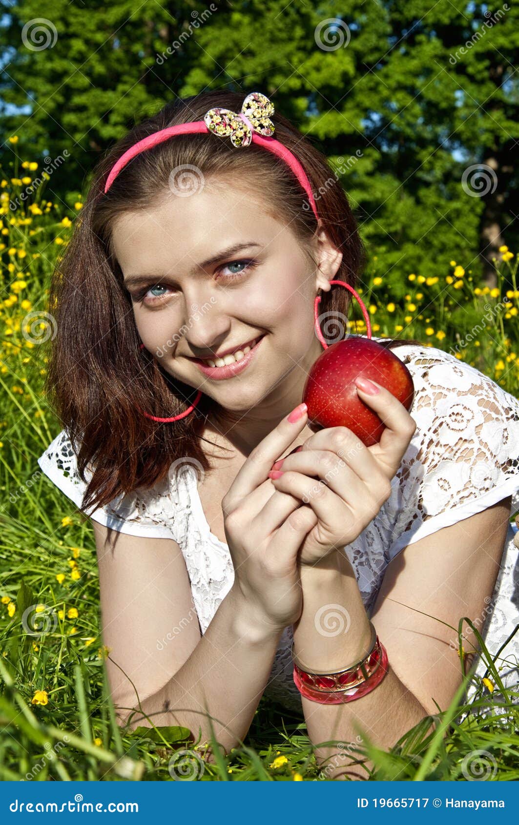 Girl with apple stock image. Image of leisure, field - 19665717