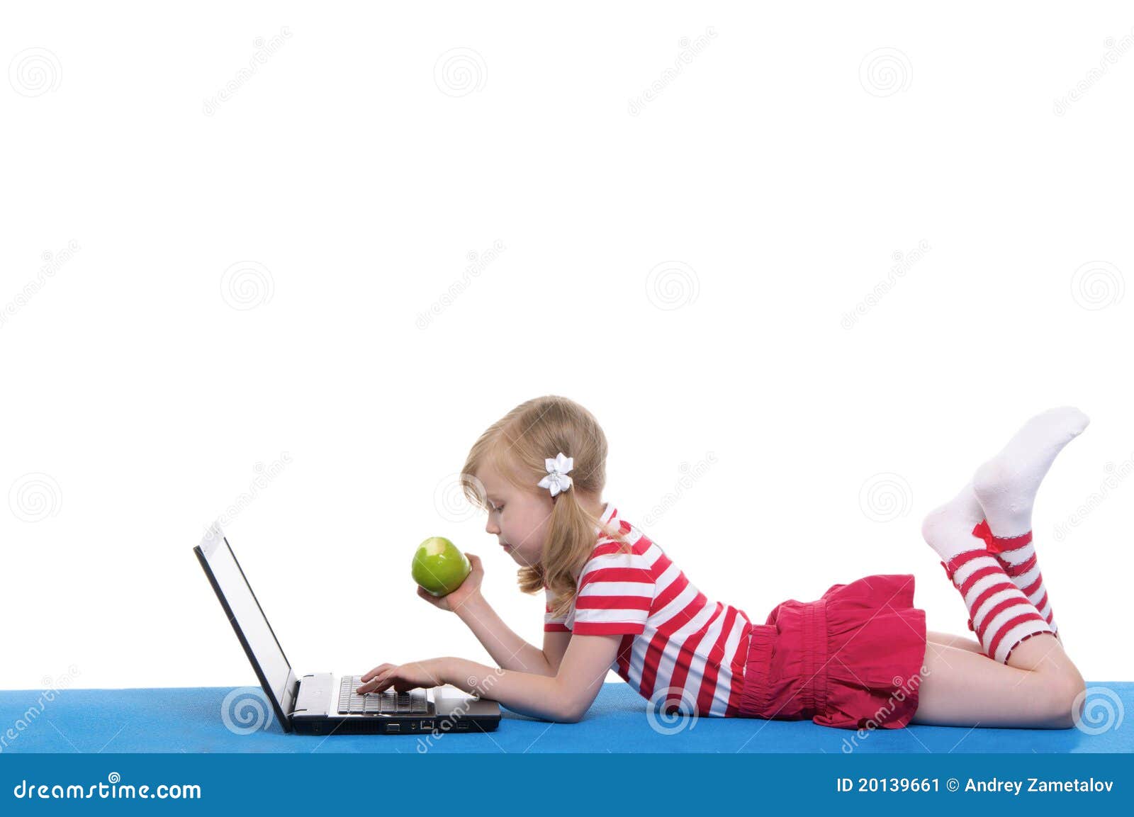 Girl with an Apple and Laptop on Rug Stock Image - Image of caucasian ...