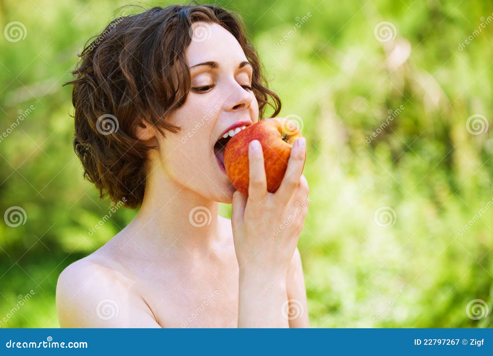 Girl with apple outdoors stock image. Image of foods - 22797267