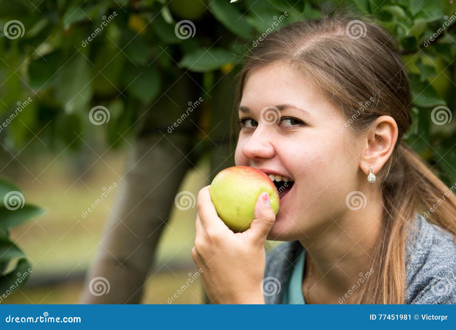 Girl with apples stock image. Image of fruit, person - 77451981