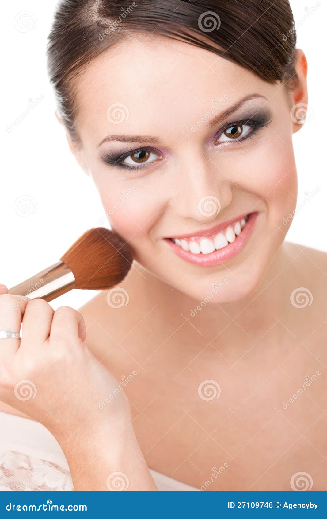 Girl Applying Cosmetics To Her Face Stock Photo - Image of brown ...