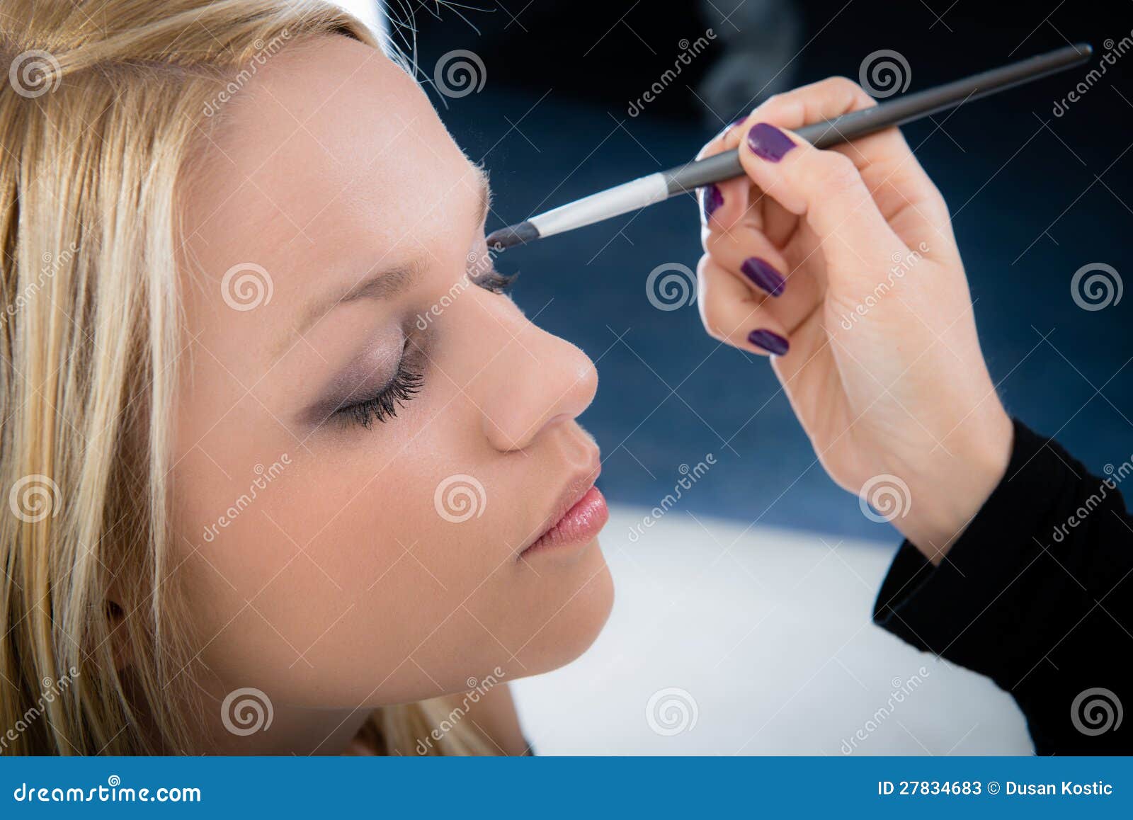 Girl applying make-up stock image. Image of accessory - 27834683