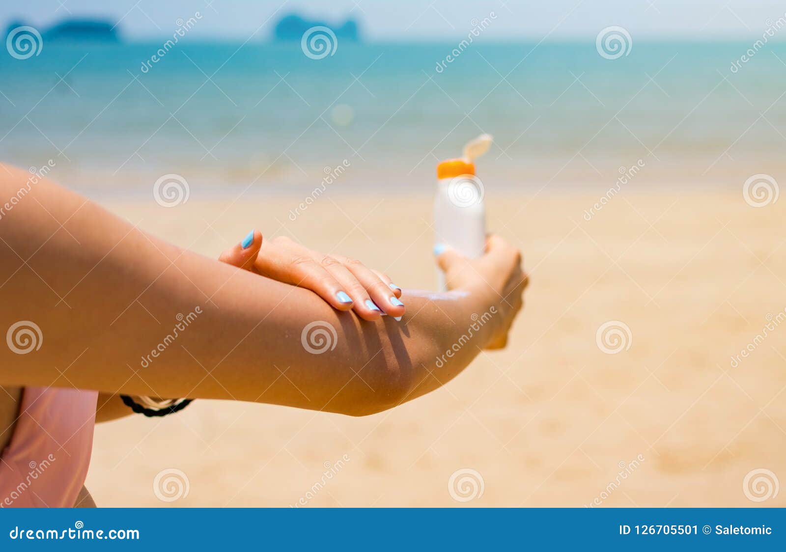 Girl Applying Sun Lotion on the Beach Stock Image - Image of female ...