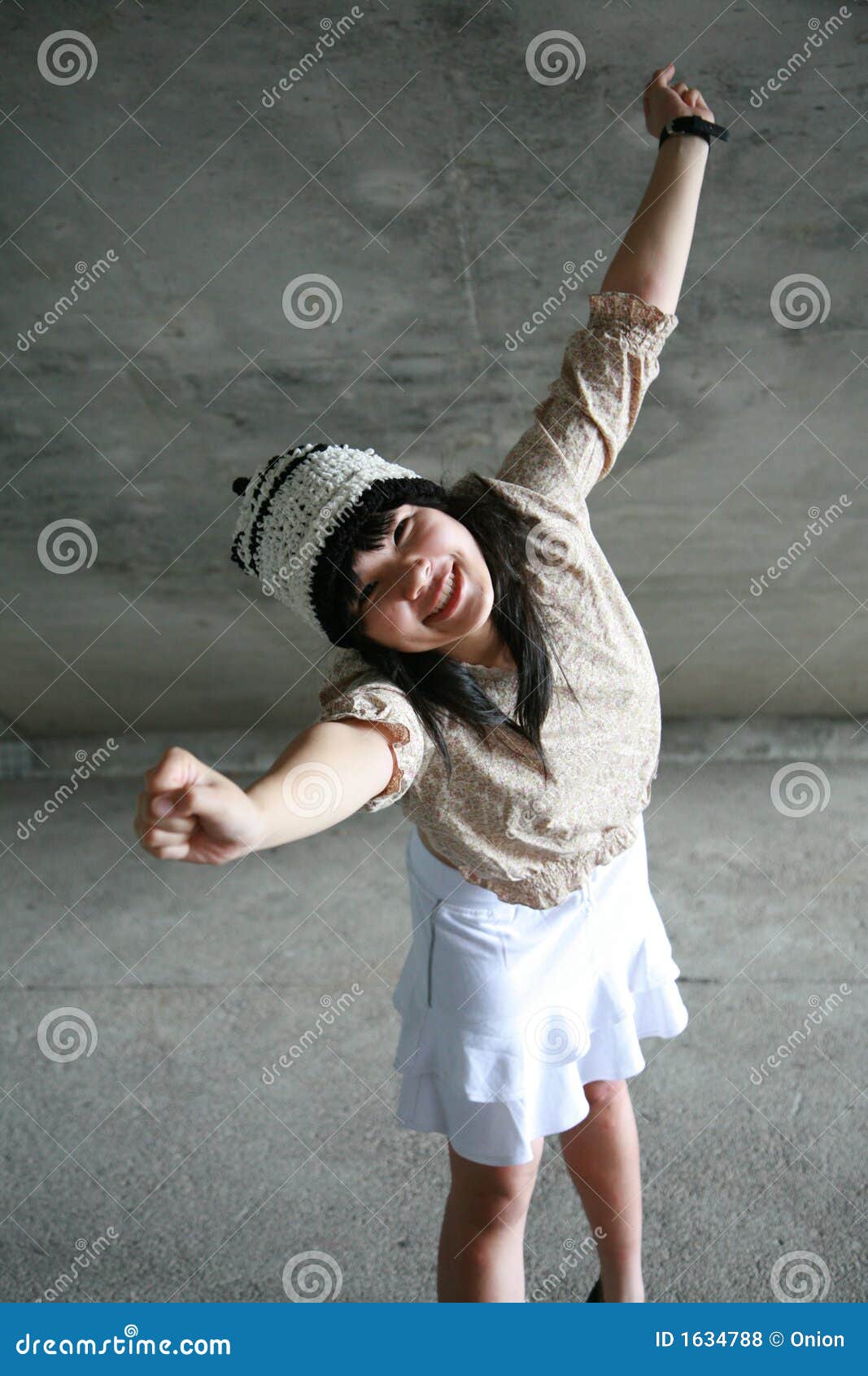 Girl with arms raised stock photo. Image of expression - 1634788
