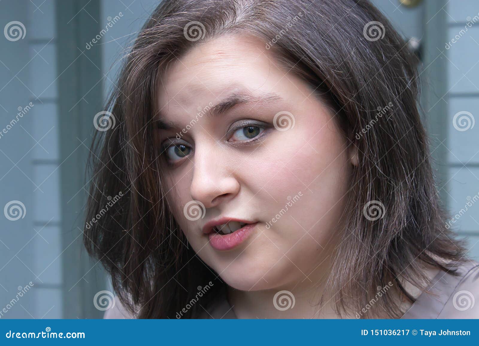Girl Asking a Question Outside Against Blue Home Stock Image - Image of ...