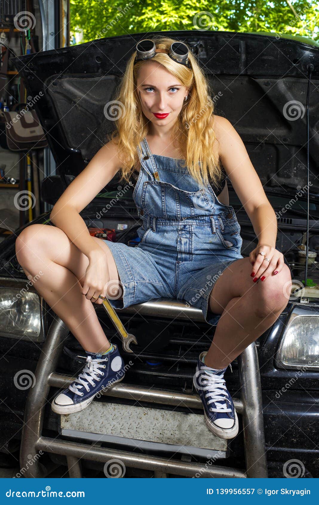 Girl Auto Mechanic in Garage Stock Image - Image of camera, beautiful ...