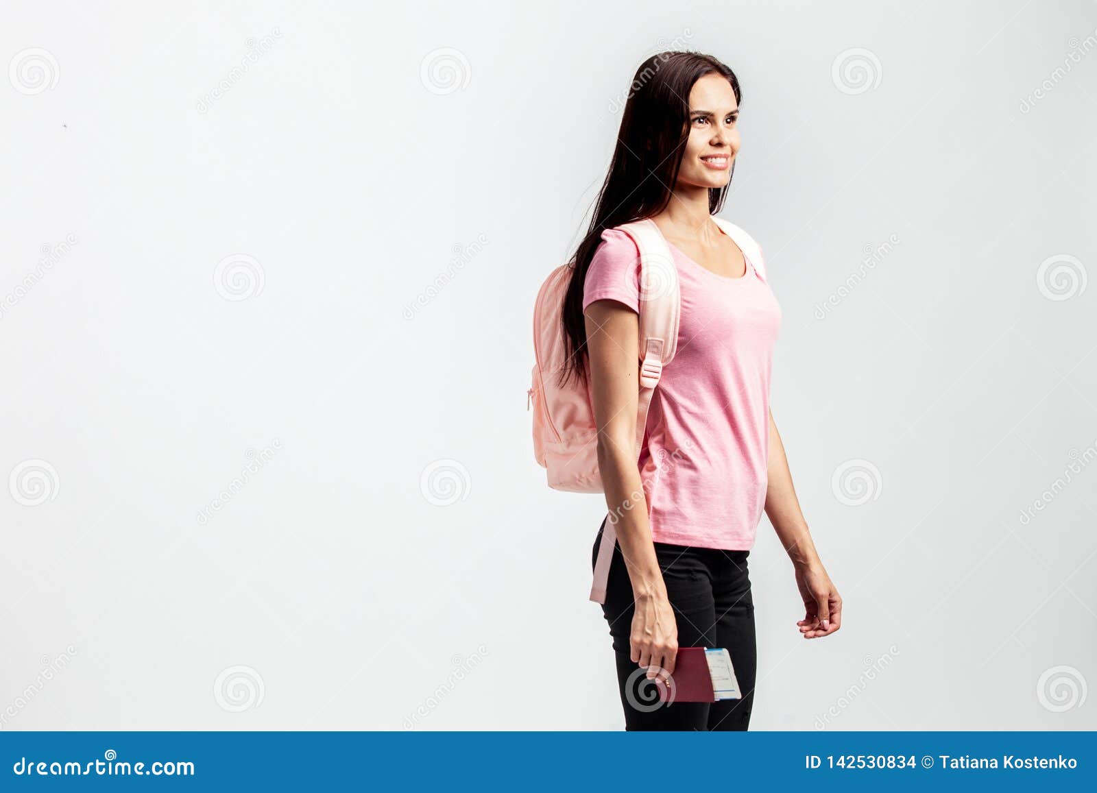 Girl With A Backpack On Her Shoulders Dressed In Pink T Shirt An Stock