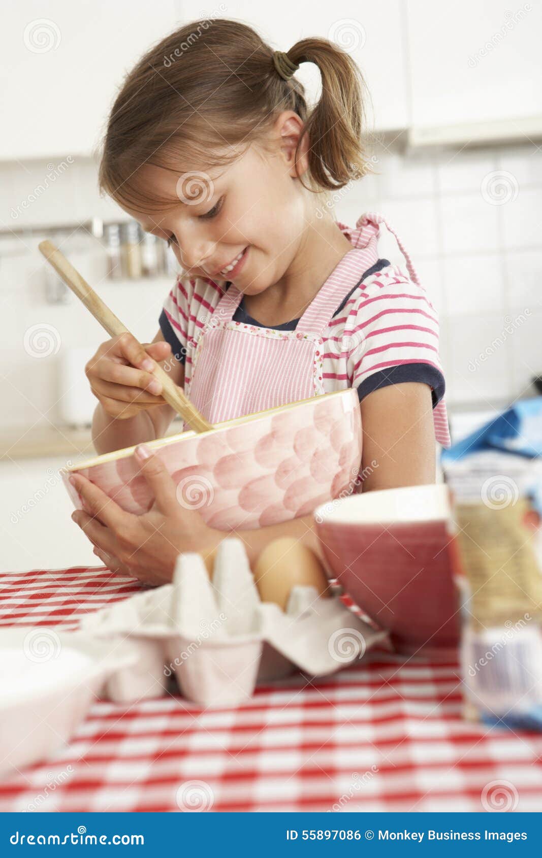 Girl Baking in Kitchen stock photo. Image of kitchen - 55897086