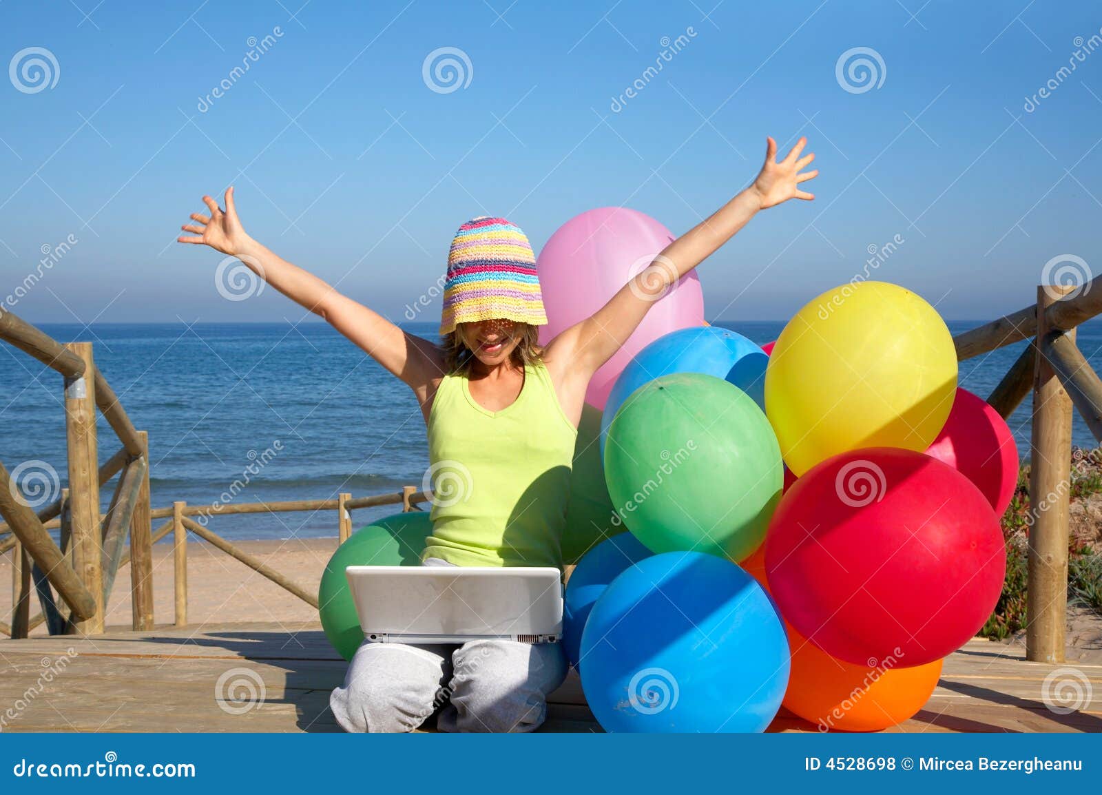 Girl with Balloons Using a Laptop Stock Photo - Image of communication ...