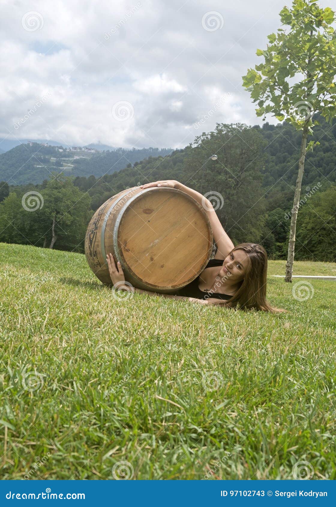 A girl with a barrel stock image. Image of haze, barrel - 97102743