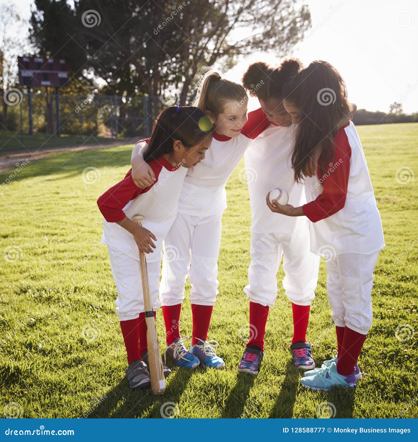 Girl Baseball Team in a Team Huddle, Motivating before Game Stock Image ...