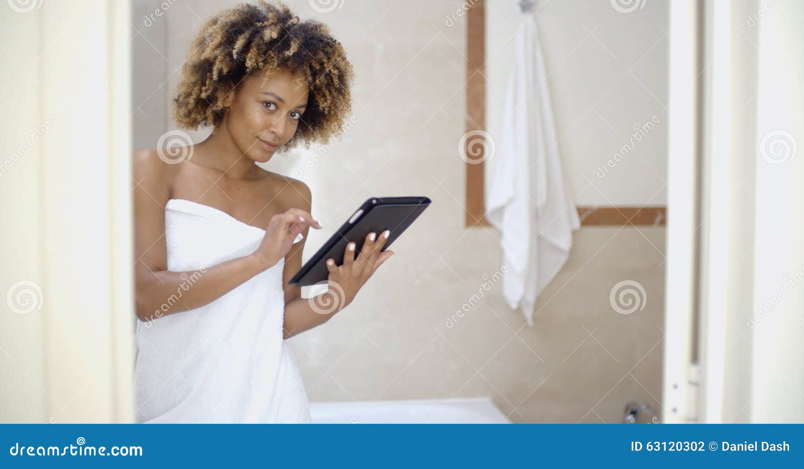 Girl in Bath Towels Using Touchpad Stock Photo - Image of networking ...