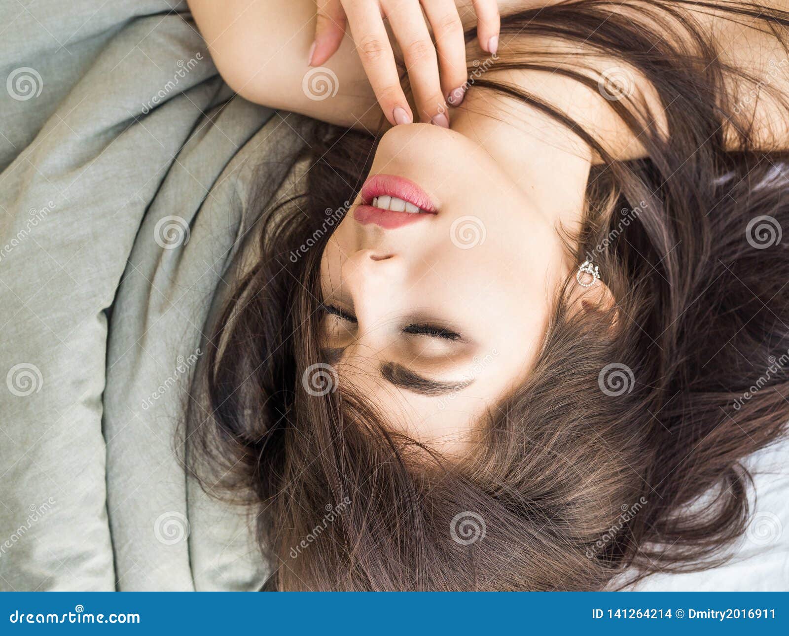 Girl With Beautiful Hair Lying On The Bed Skin Care Concept Stock