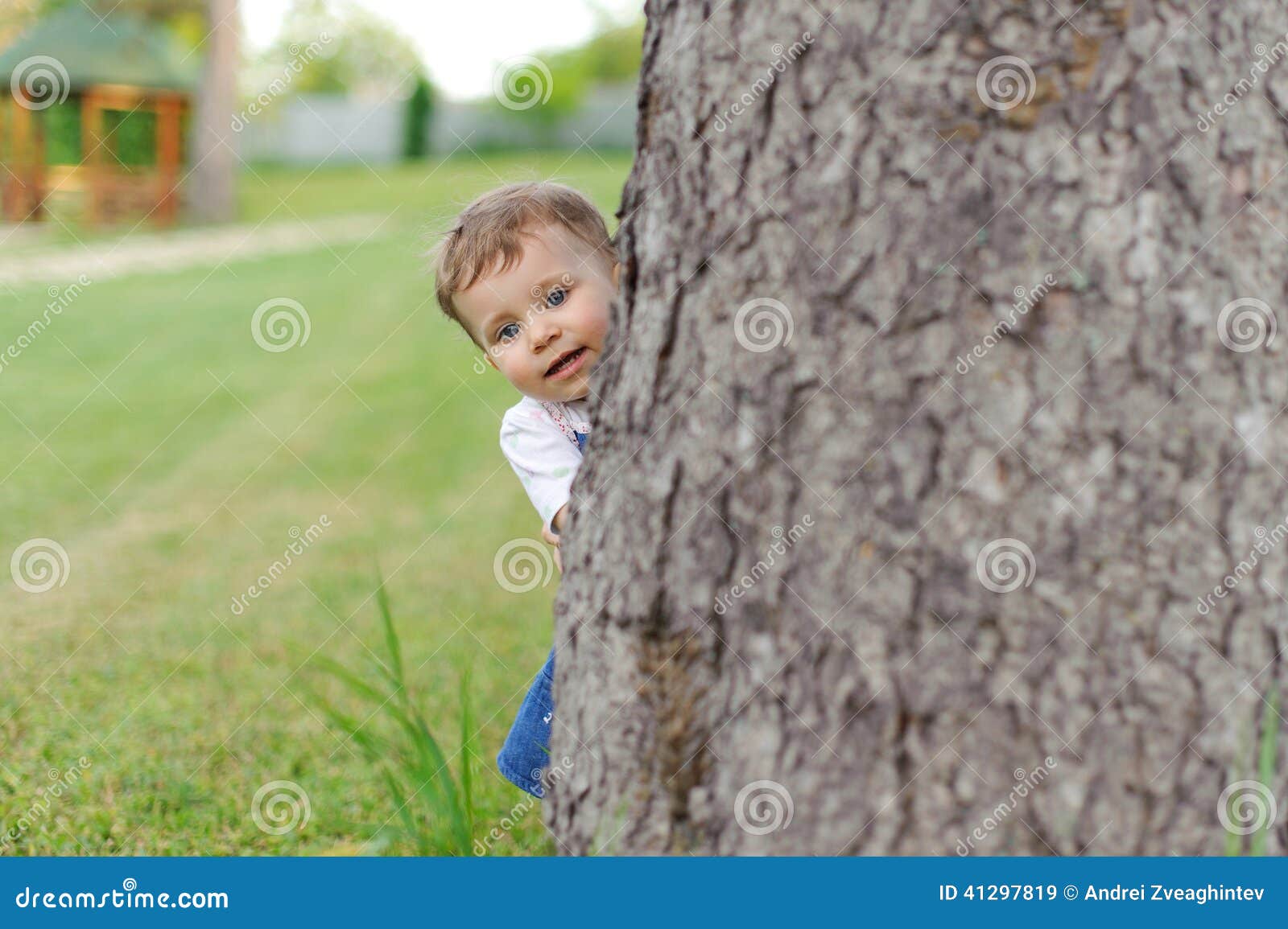 Girl Behind Old Tree stock image. Image of childhood - 41297819