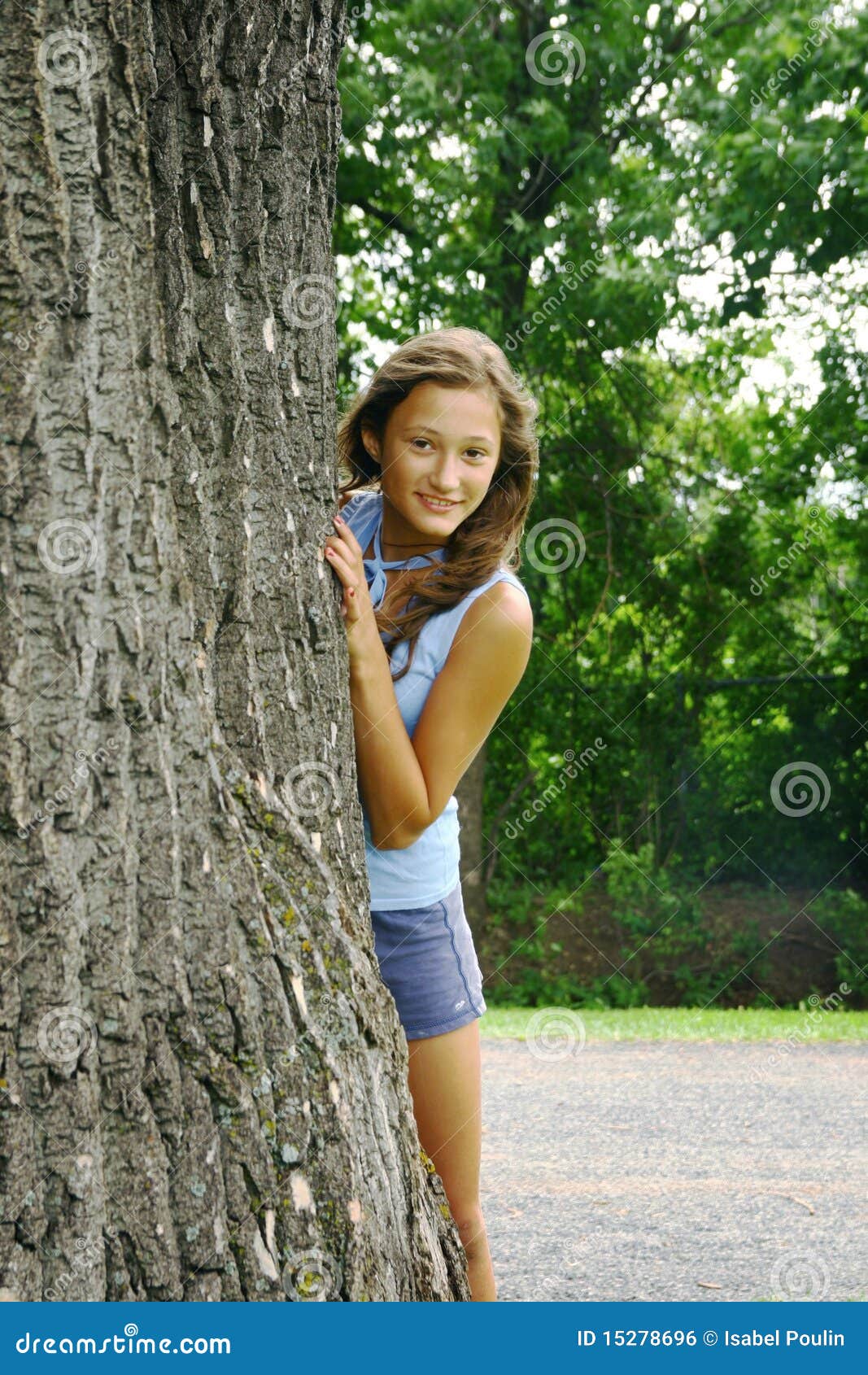 Girl behind a tree stock photo. Image of outside, park - 15278696