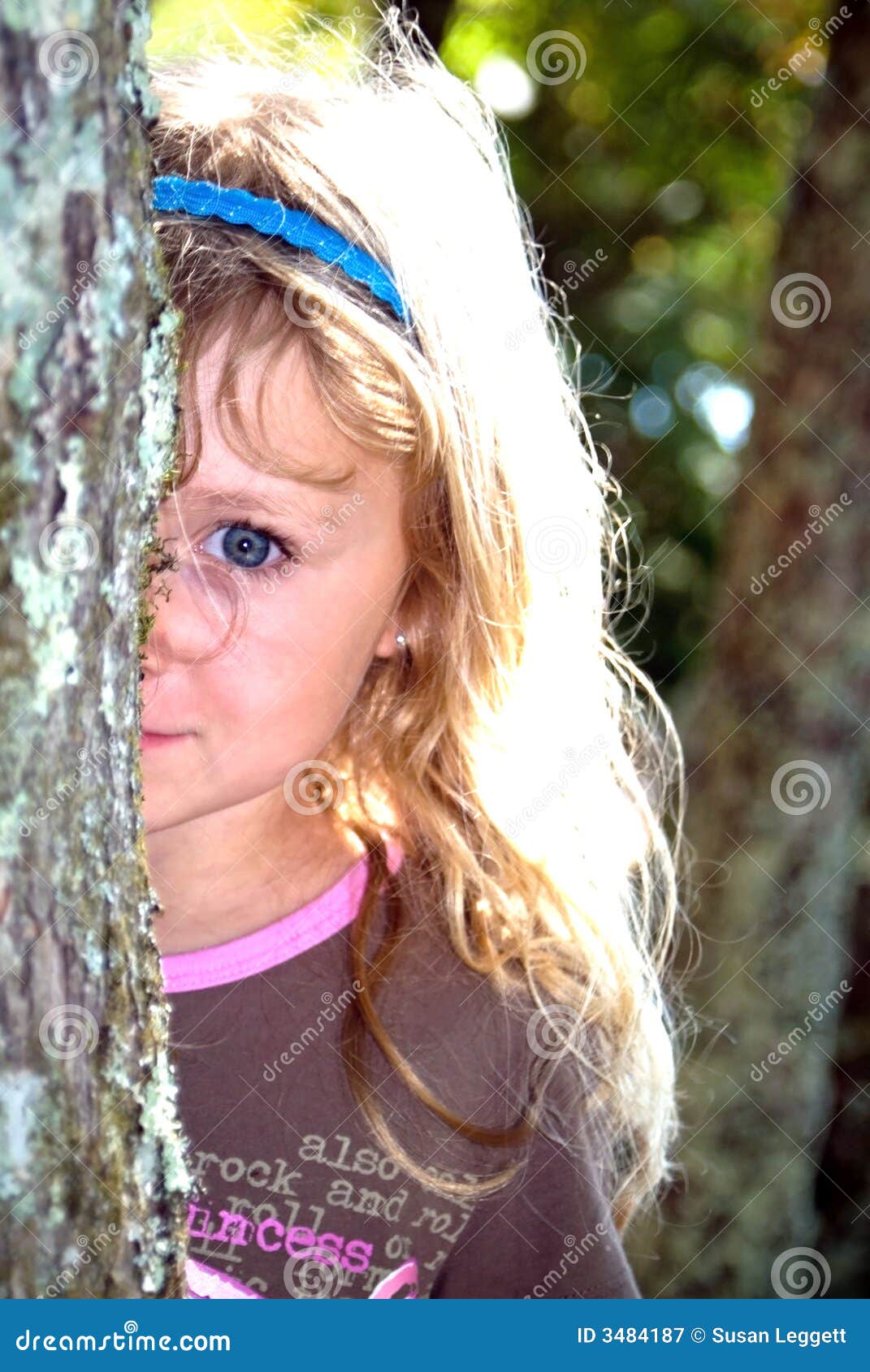 Girl behind a tree stock image. Image of caucasian, blue - 3484187