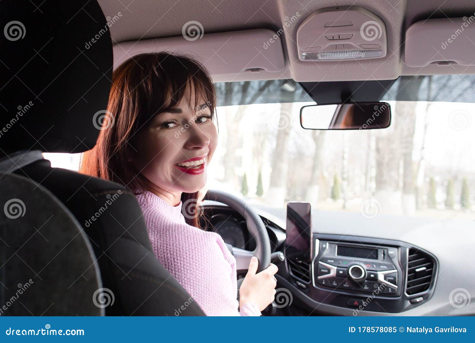 Girl Behind the Wheel Smiles Stock Image - Image of automobile ...