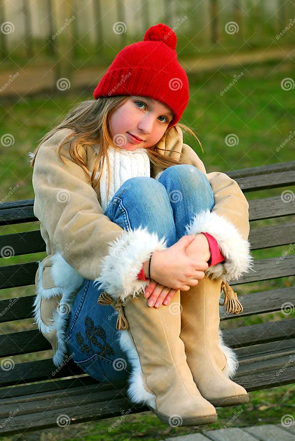 Girl on bench stock photo. Image of clothes, kids, female - 1569520