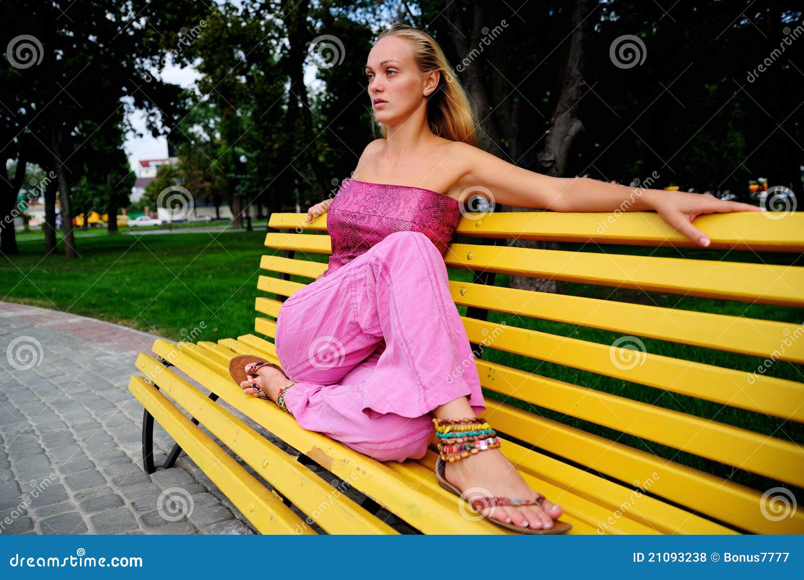 Girl on a bench stock photo. Image of park, pink, green - 21093238