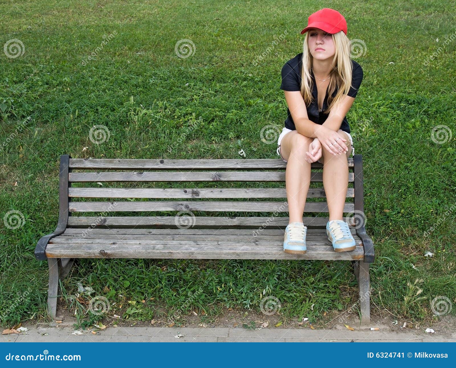 Girl on bench stock image. Image of chemise, black, sitting - 6324741