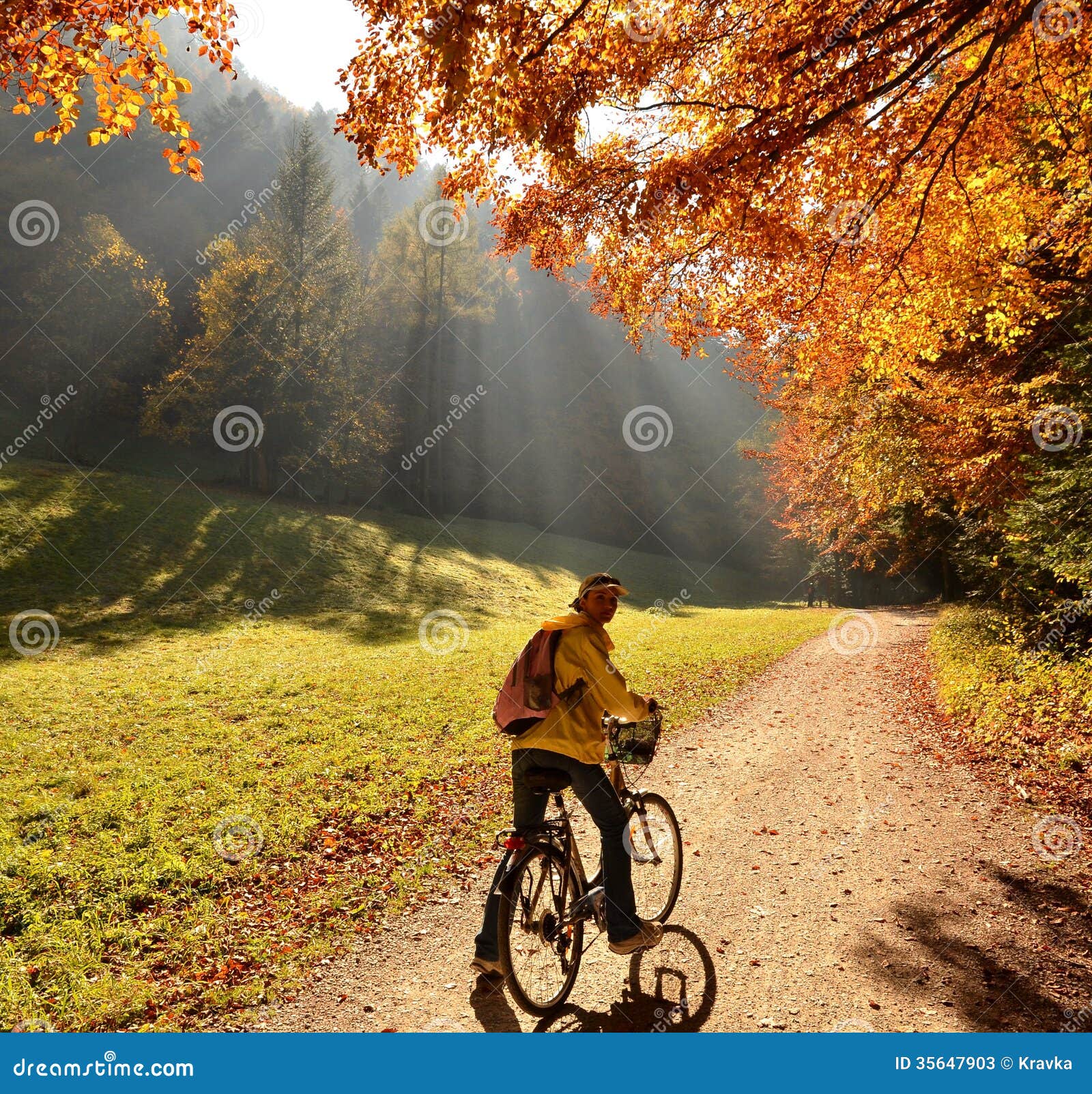 Girl on bicycle in autumn stock image. Image of landscape - 35647903