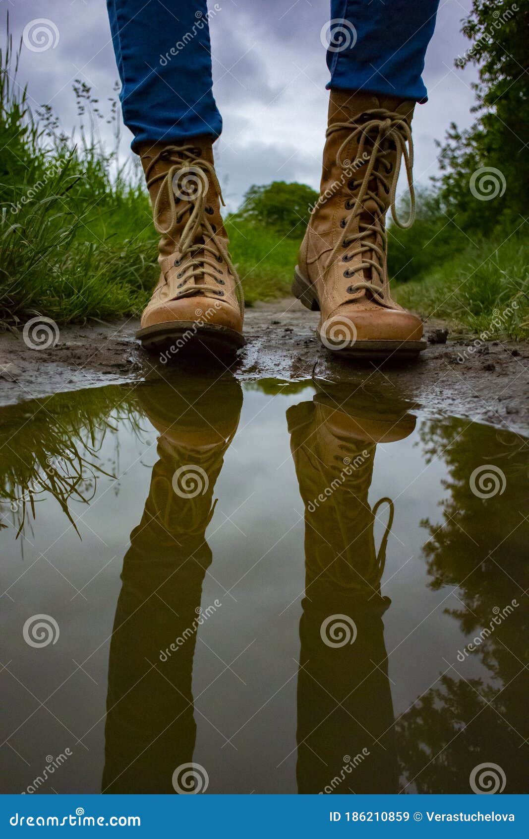 Boots is Walking in a Puddle Stock Image - Image of boots, fall: 186210859
