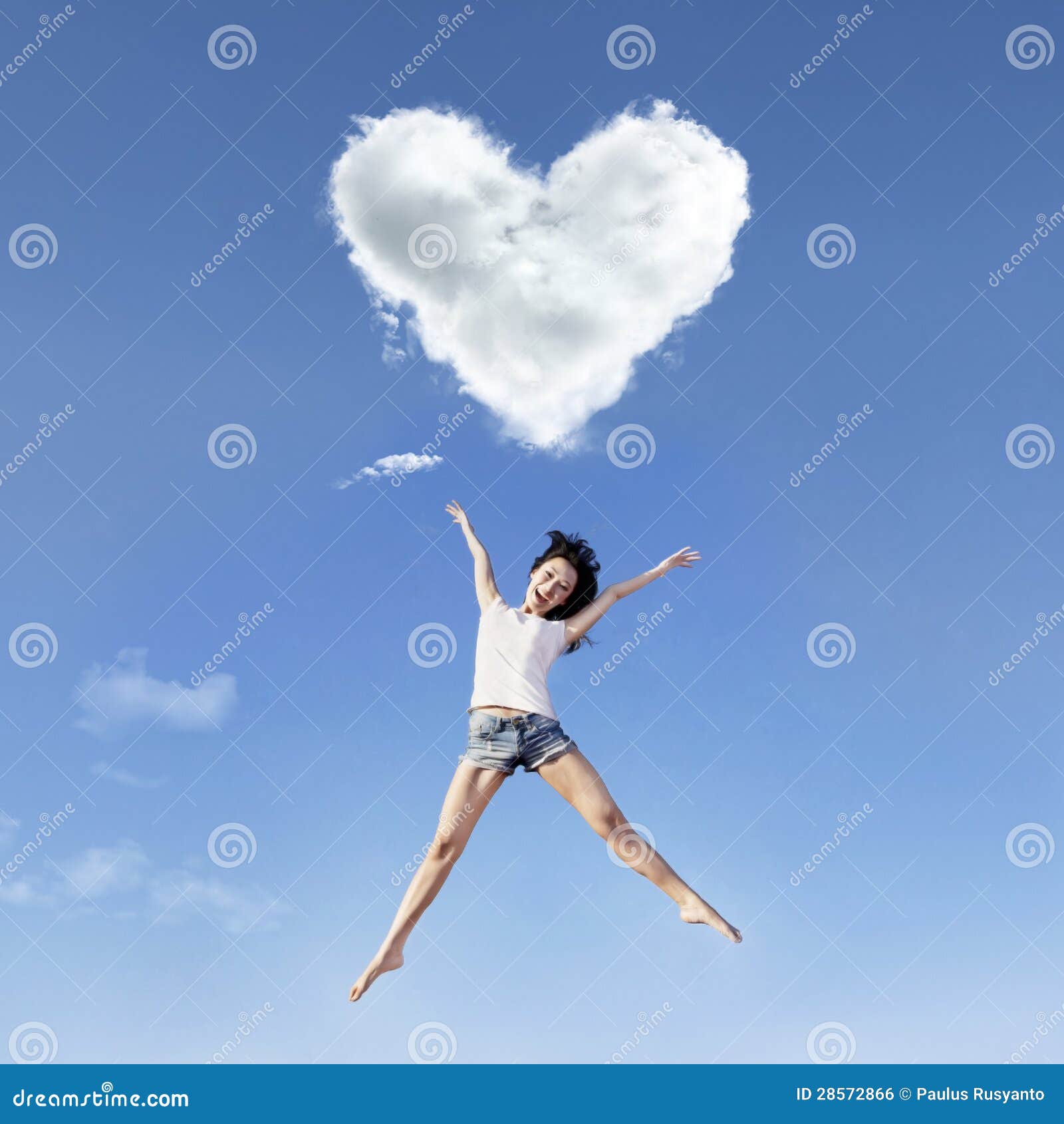 Girl Big Jump Under Heart Clouds Stock Photo - Image of attractive ...
