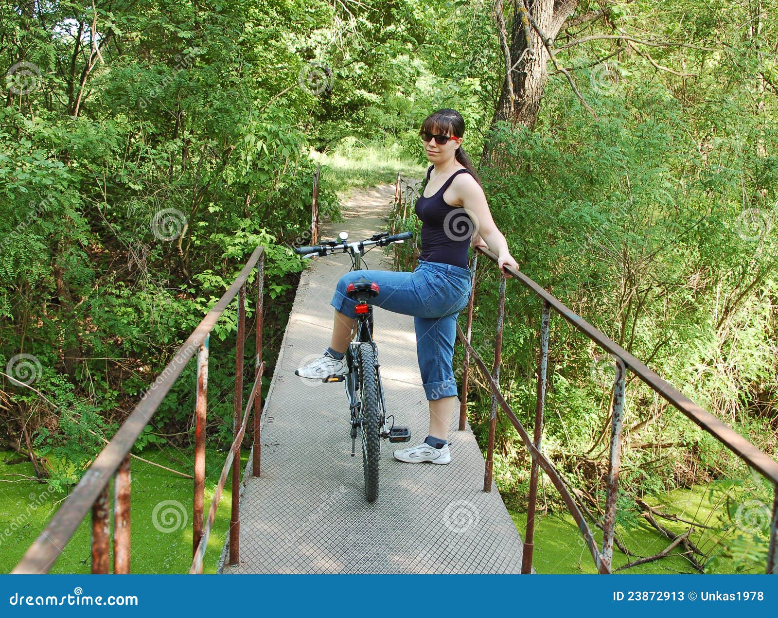 Bike On Red Footbridge Stock Photography | CartoonDealer.com #41620796