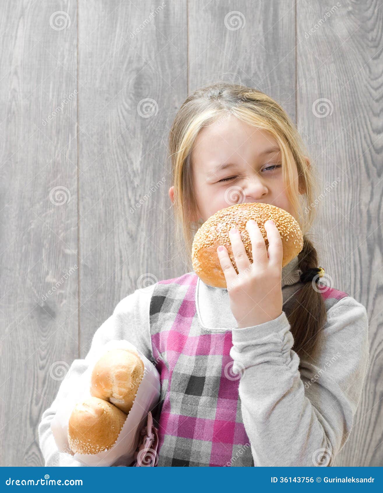 Girl bites off a bun stock photo. Image of positivity - 36143756
