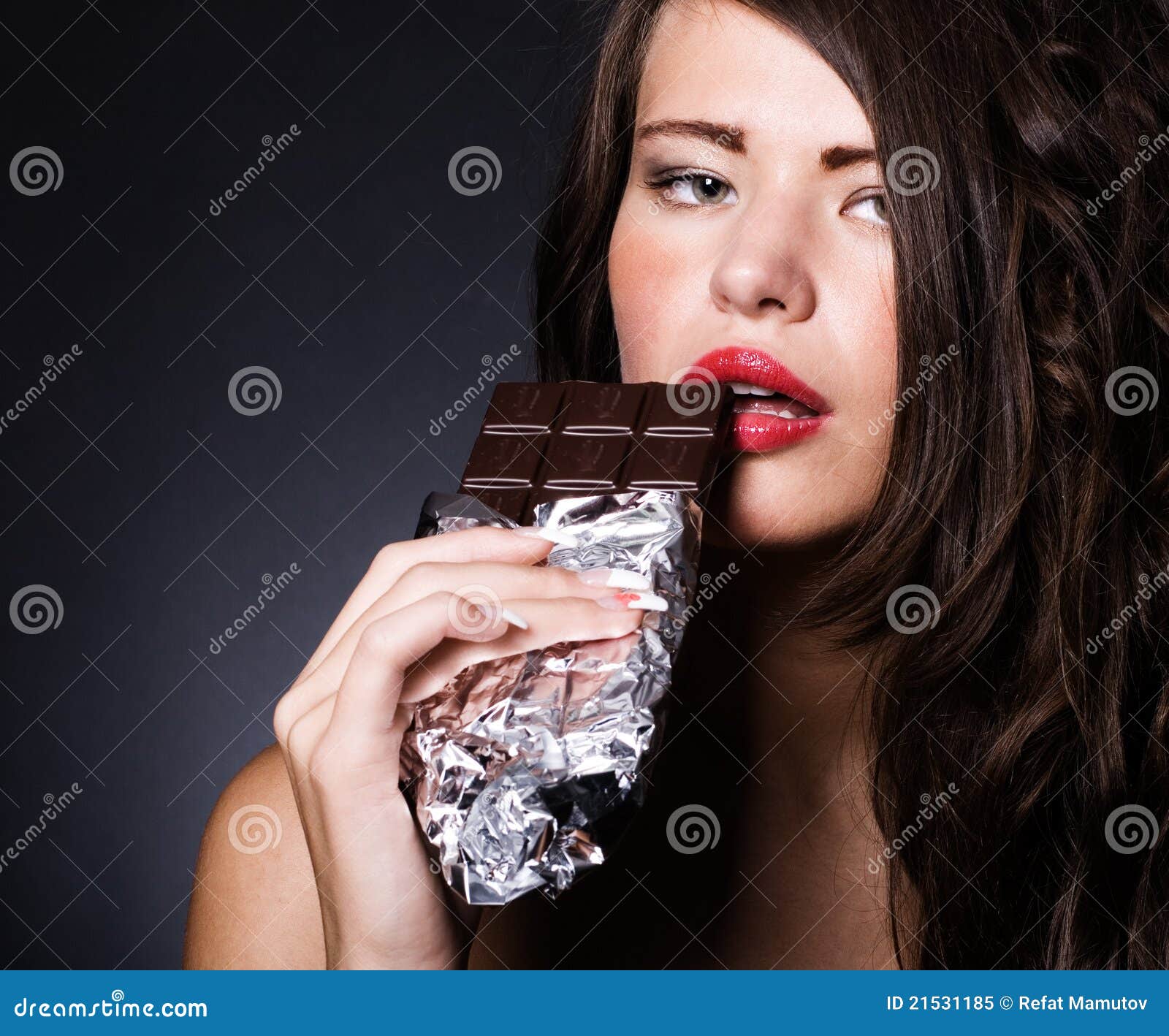 Girl Biting a Chocolate Bar. Stock Image - Image of eating, desire ...