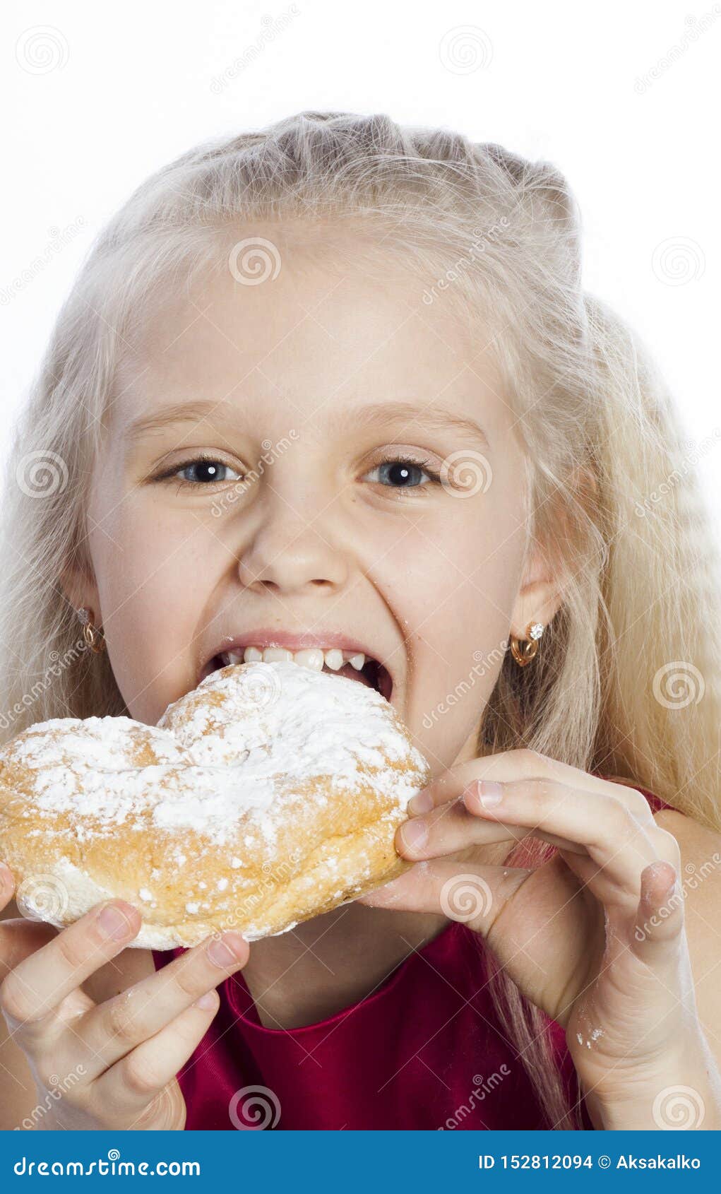Girl Biting a Heart-shaped Biscuit Stock Photo - Image of holding, food ...