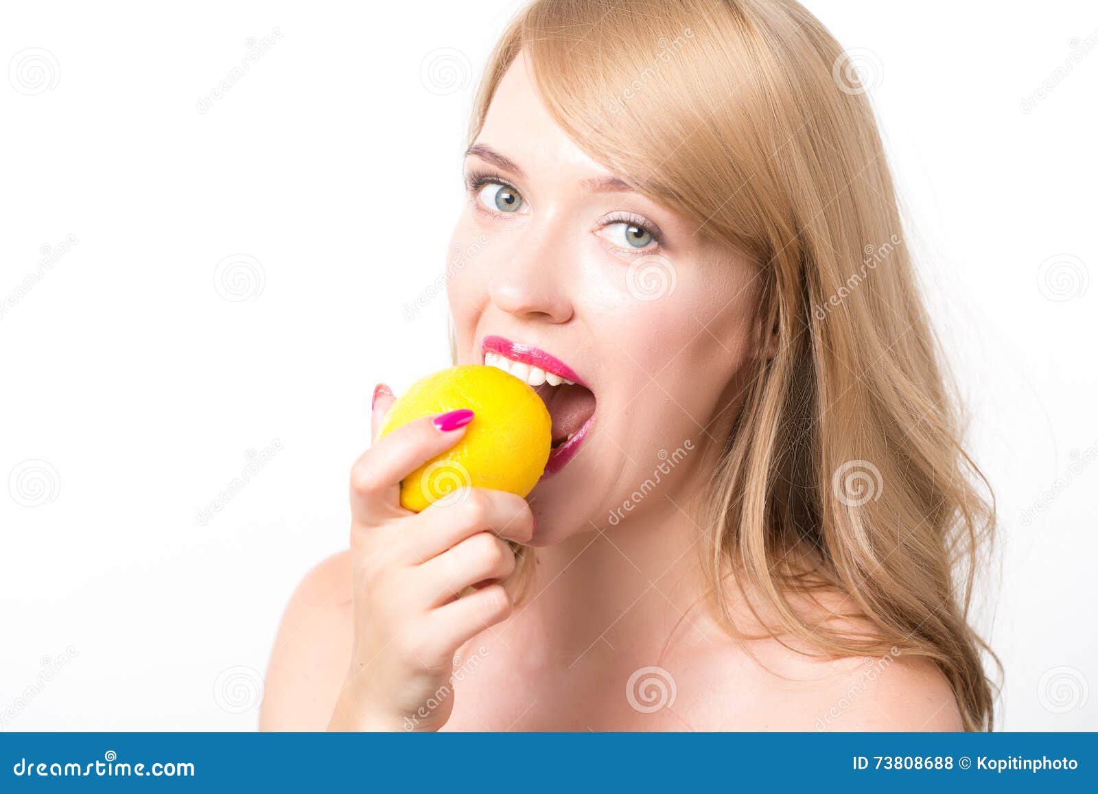 Girl biting a lemon stock photo. Image of color, drink - 73808688