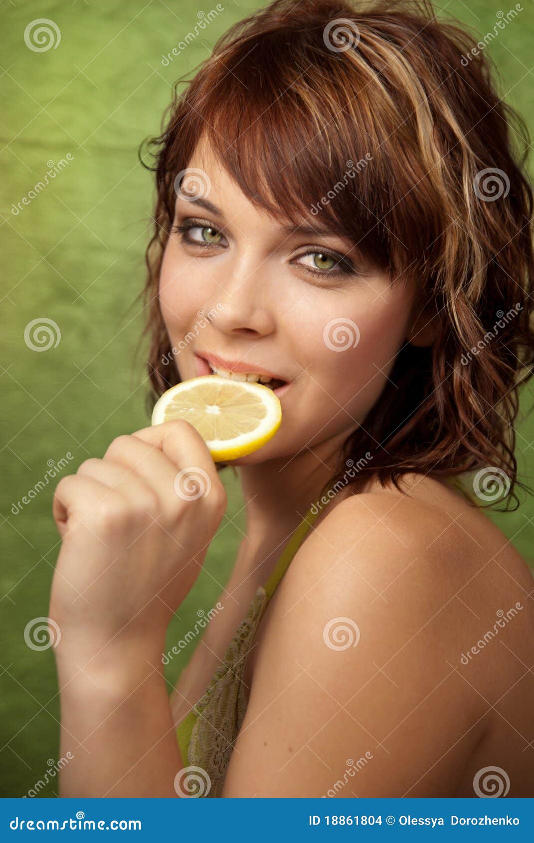 Girl biting slice of lemon stock photo. Image of lemon - 18861804