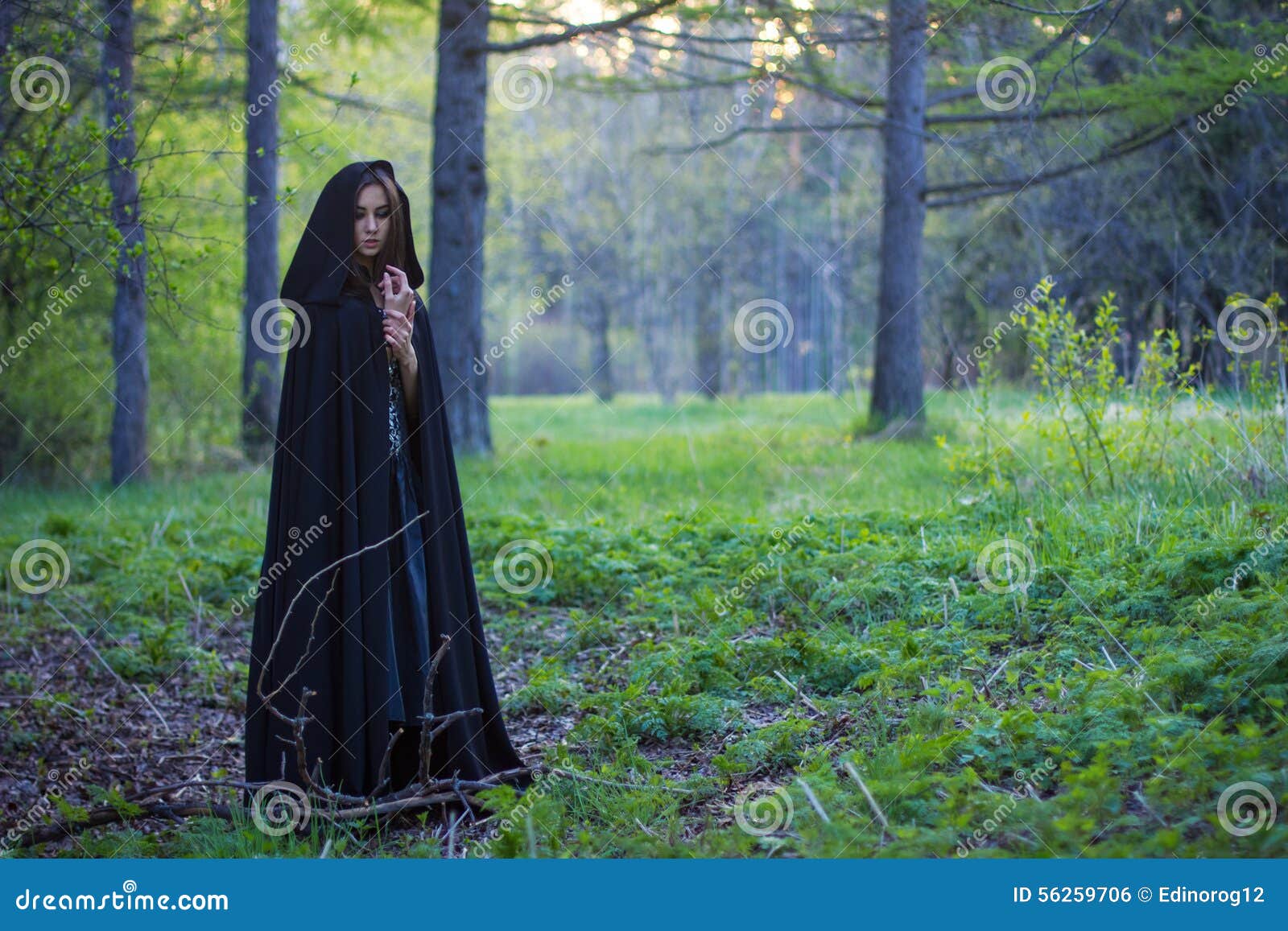 The Girl with the Black Cloak in the Forest Stock Photo - Image of ...